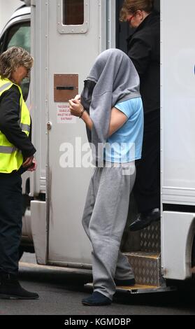 A prisoner arrives at court in a GEOamey prison van. Picture by James ...