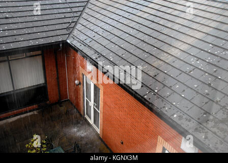 Gutter overflowing in heavy rain Stock Photo - Alamy