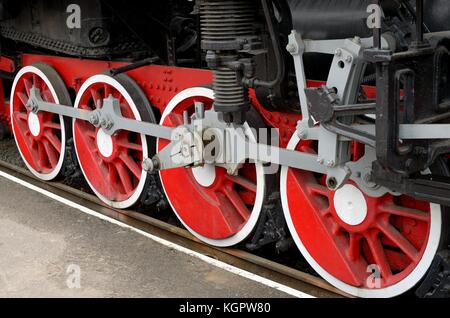 red wheels of steam locomotive-chassis vehicle Stock Photo - Alamy