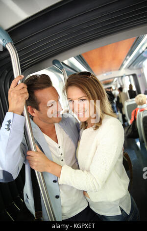 People in town taking public transportation Stock Photo - Alamy