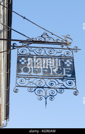Metal ornate sign post Stock Photo - Alamy
