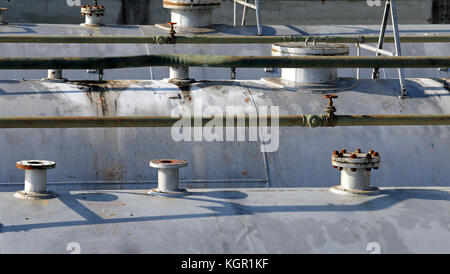 many huge tanks for the storage of methane gas in an industrial zone ...