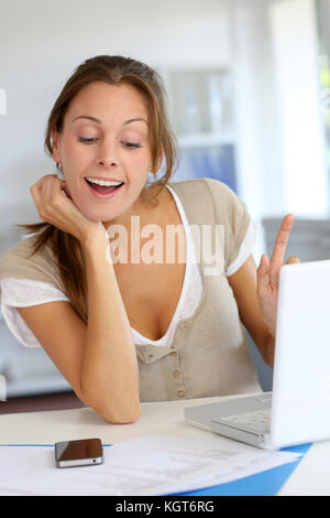 Home-office worker with questioning look on her face Stock Photo - Alamy