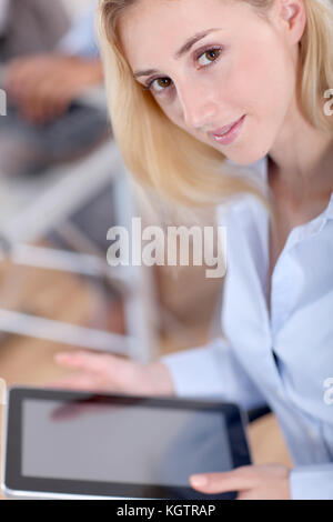 Protrait of office worker using electronic tablet Stock Photo - Alamy