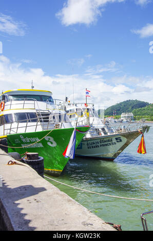 Thai fishing boats at a pier or wharf in Thailand Southeast Asia Stock Photo - Alamy