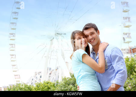 Girl in Front of Ferris Wheel Stock Photo - Alamy