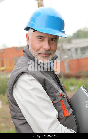 Portrait of entrepreneur on building site Stock Photo - Alamy