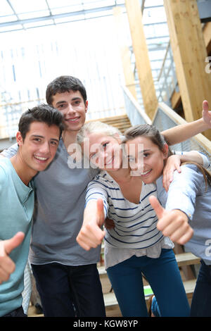Group of people students graduated standing with winner expression at ...