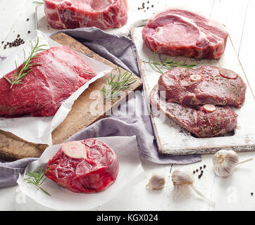 Fresh raw meat. Different types of raw pork meat, chicken fillet and ...