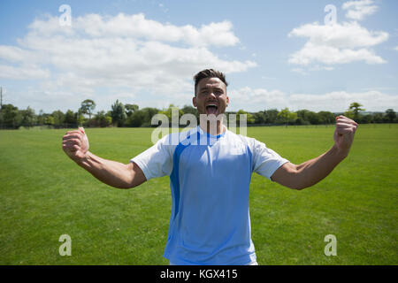 Excited football player celebrating after scoring the goal in the ...