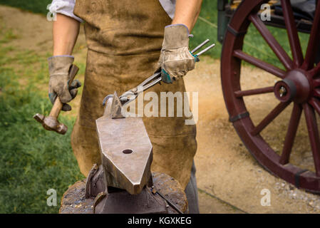 Worker metal craftsman, an artisan detail, tradition and old work Stock ...