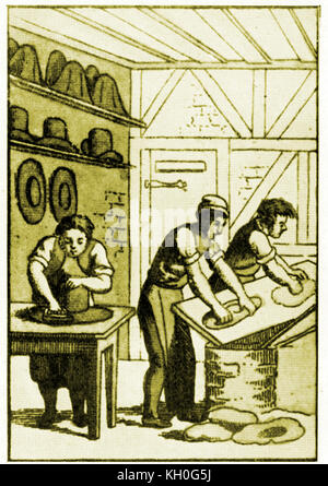 Workers in a Luton (UK) hat factory, shaping and making straw hats ...