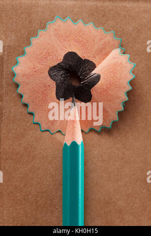 Creative idea concept with pencil shavings veiled under a light bulb ...
