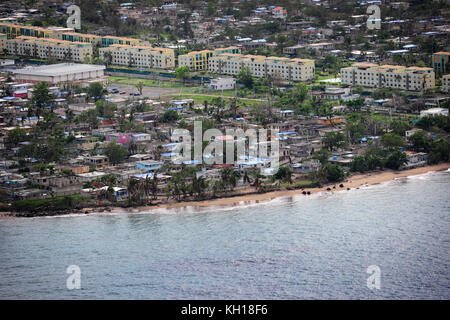 Aerial view of blue FEMA tarps on houses in the wake of Hurricane ...