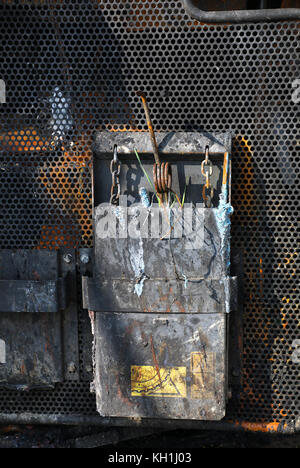 Detail of a burnt out combine harvester Stock Photo - Alamy