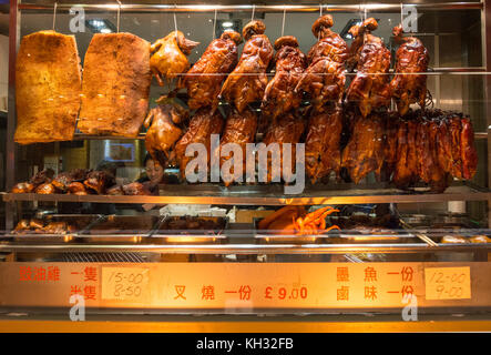 CRISPY PEKING DUCK SOHO Restaurant Window display hanging air drying in ...
