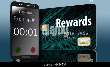 A rewards credit card that has an expiration date is seen with a cell ...