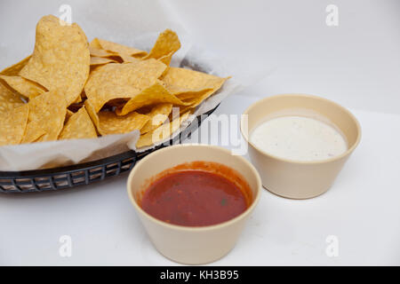 Tostada Chips and two kinds of dip Stock Photo - Alamy