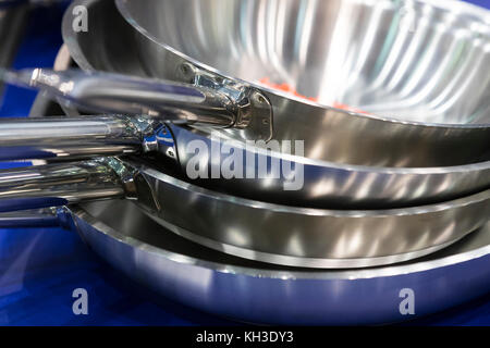 Several iron pans for cooking close-up food Stock Photo - Alamy