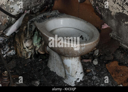 Toilet in burned home Stock Photo - Alamy