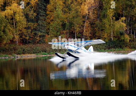 Piper "Super Pacer" floats dockside at Christiansen Lake near Talkeetna ...