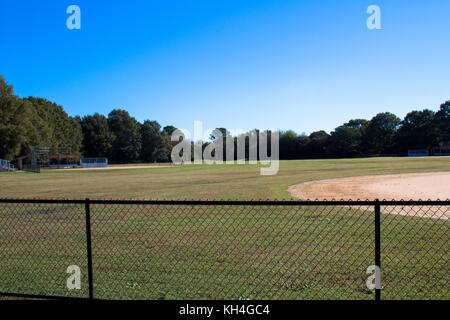 Gate around baseball field Stock Photo - Alamy