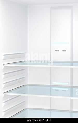 A view inside an empty household fridge or freezer with glass shelves ...