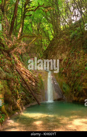 Waterfall and lake in the ravine Chudo-Krasotka in summer day, Sochi ...