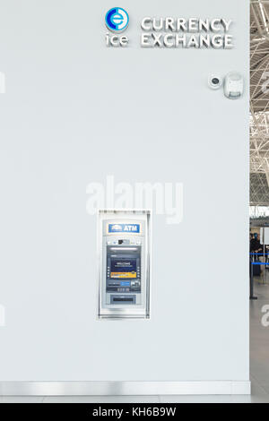 ATM machine and currency exchange with CCTV camera Stock Photo - Alamy