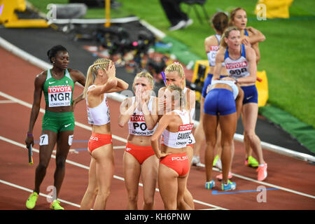 Polish team celebrates their Silver Medal at the 4x400 Metres Relay ...