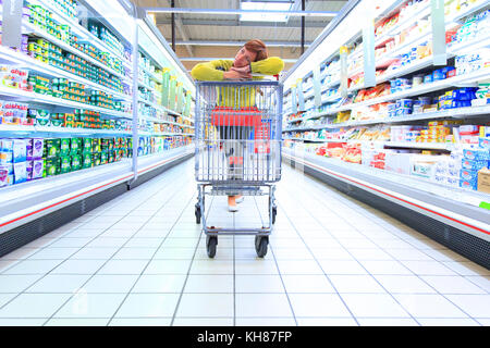 France, sad woman in a supermarket Stock Photo - Alamy