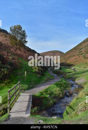 Hikers in Carding Mill Valley a popular walking destination in the ...