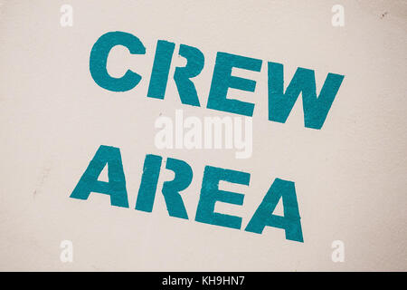 Crew only sign on white door onboard ferry cruise ship Stock Photo - Alamy
