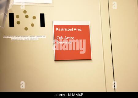 Restricted area operating room attire sign Stock Photo - Alamy