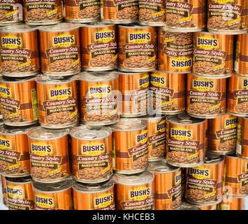 Tins of baked beans on a shelf at North Paddington foodbank waiting ...