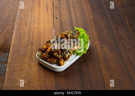 deep fried fish skin , popular asian snack Stock Photo - Alamy