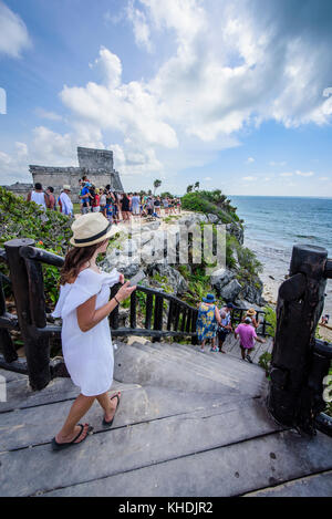 Tourist in the stairs close to the main structure over the Caribbean ...