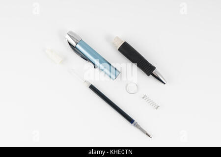 a ballpoint pen disassembled on a white background Stock Photo - Alamy