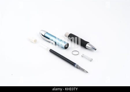 a ballpoint pen disassembled on a white background Stock Photo - Alamy