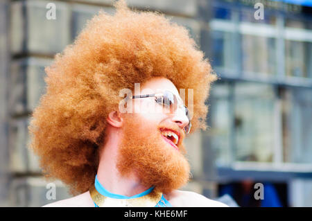 7ft tall drag artist Gingzilla with ginger afro hair, beard and ...