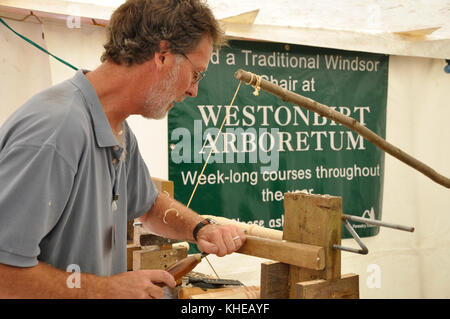 Woodturning using a bodgers pole lathe to make a traditional Windsor ...