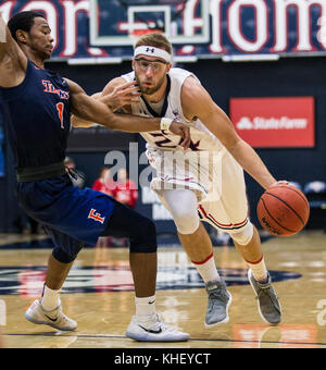 Saint Mary's (Cal.) forward Calvin Hermanson, right, shoots over San ...