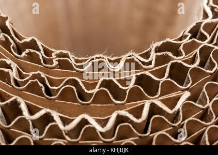 Circular coil of corrugated cardboard. Top view Stock Photo - Alamy
