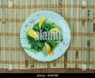 Moroccan Mallow Salad -khoubiza or bakoula , made mallow leaves Stock ...