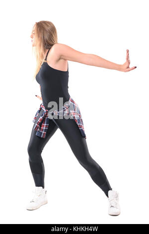 Side view of energetic female dance performer posture. Full body length ...