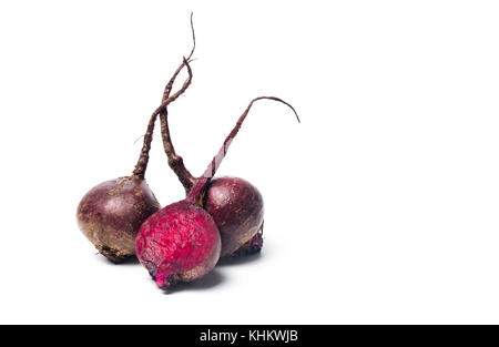 Beetroot (raw red beet) isolated on white background one bulb and cross ...