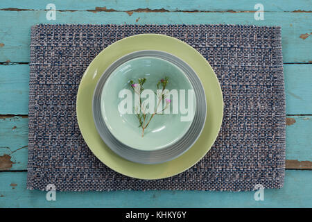 Overhead of table setting on weathered wooden plank Stock Photo - Alamy