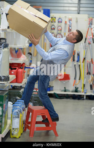worker falling off the ladder Stock Photo - Alamy