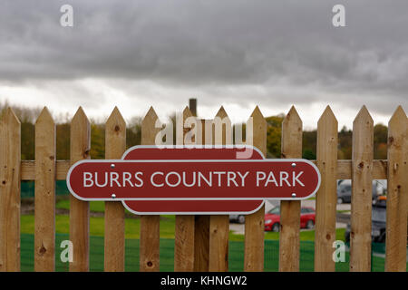 Burrs country park totem railway sign mounted on wooden fencing on the ...