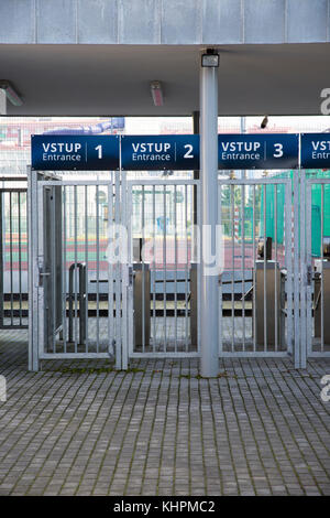 Turnstile entrance to stadium Stock Photo - Alamy
